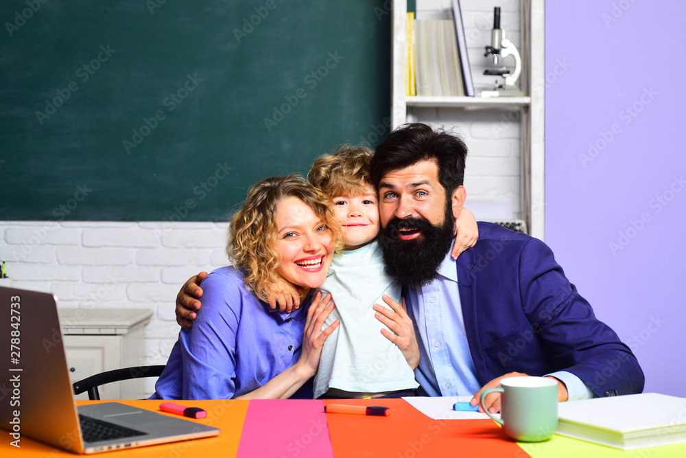 Happy family schooling together. Family school. Little boy and his ...