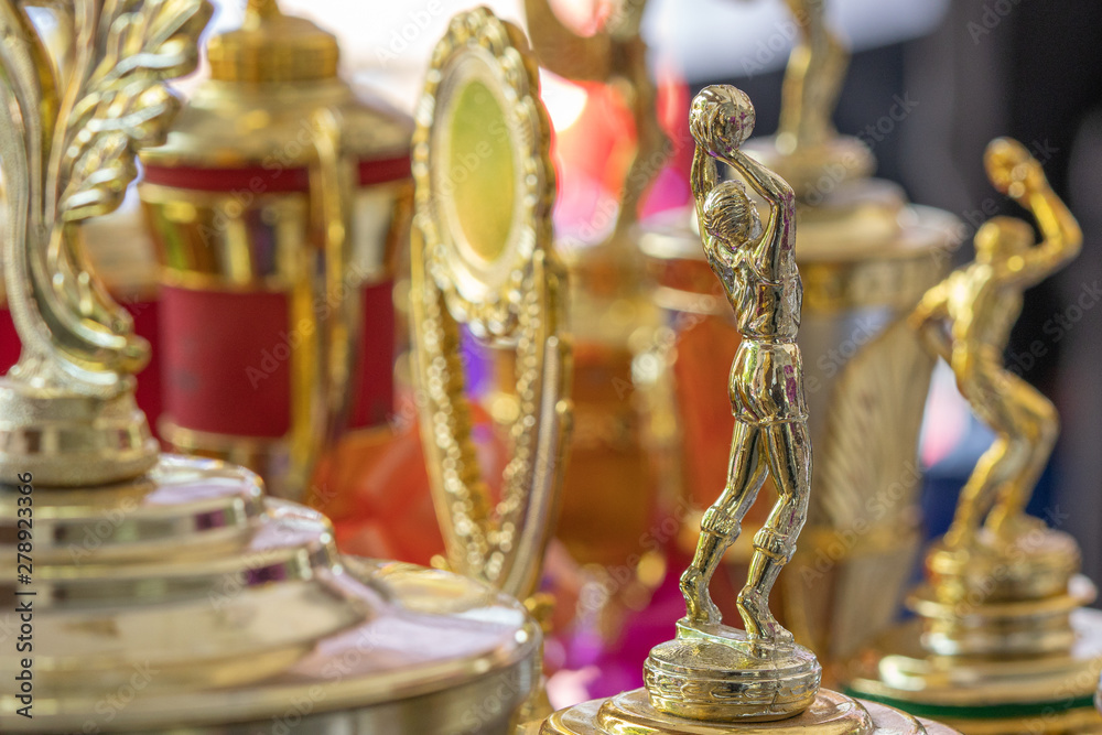 group of trophies on the table Stock Photo | Adobe Stock