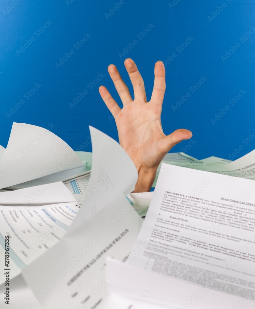 Buried Under Paperwork Stock Photo | Adobe Stock