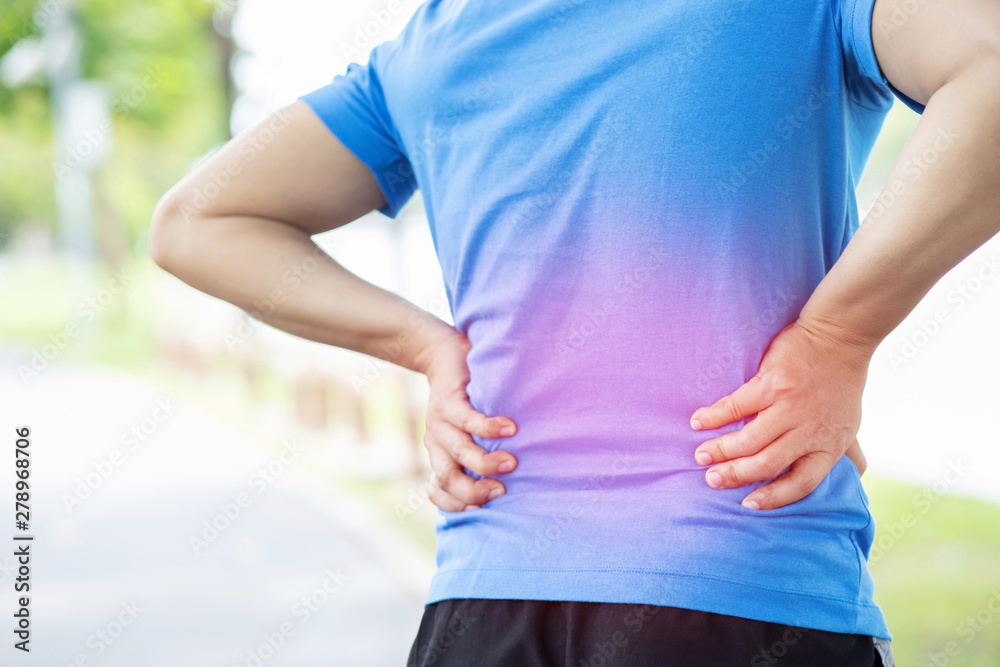 unhappy man suffering from Sport injury while exercise, with Lower back ...