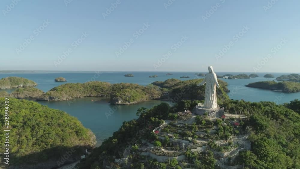 Statue of Jesus Christ on Pilgrimage island in Hundred Islands National ...