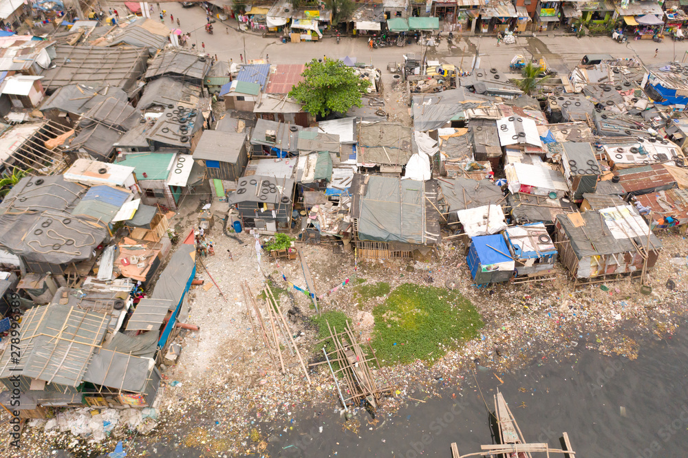 Slums in Manila, a top view. Sea pollution by household waste. Plastic ...