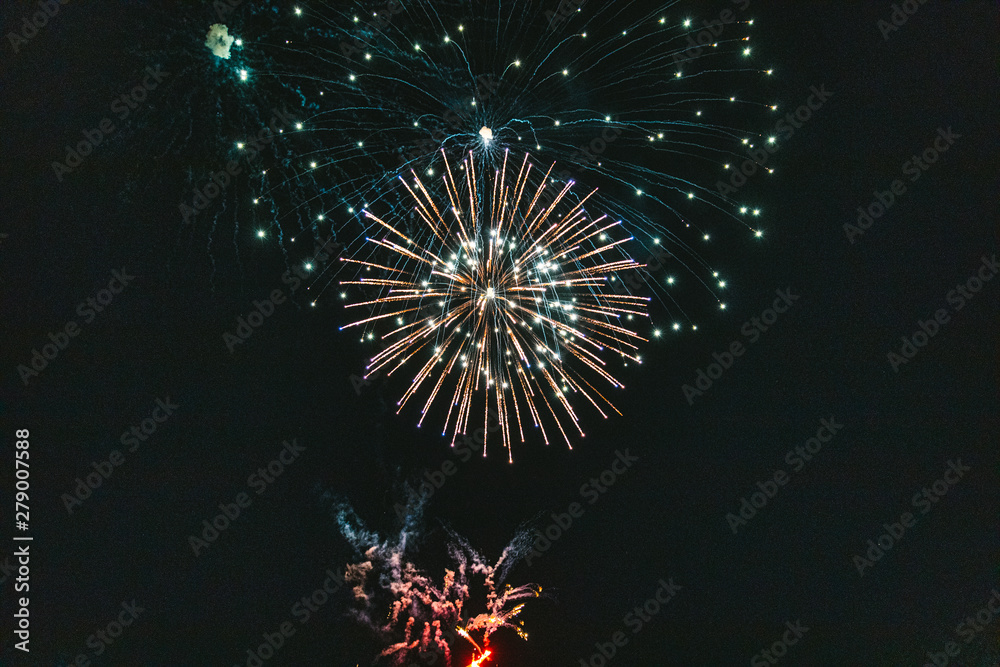 Fireworks explode in night sky Stock Photo | Adobe Stock