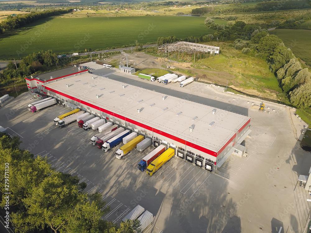 Aerial view of goods warehouse. Logistics center in industrial city ...