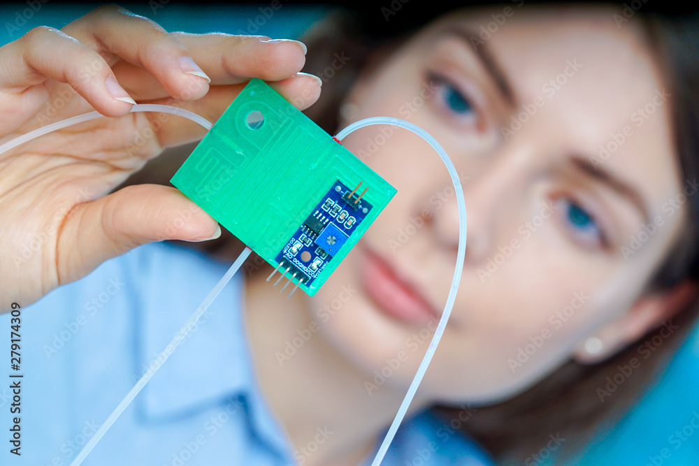 Girl holding polymers Bio-MEMS biomedical microelectromechanical ...