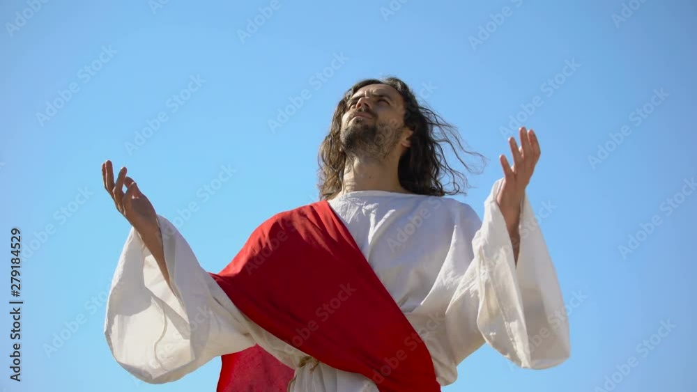 Jesus raising hands to sky and praying, resurrection and ascension of ...