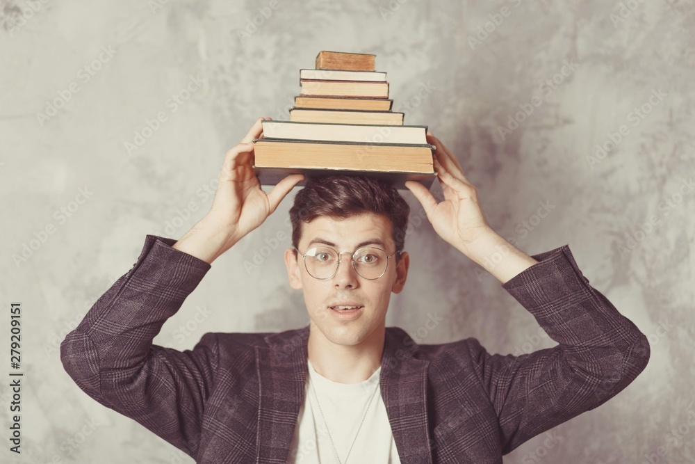 Young boy student with books in glasses. happy guy want learning, have ...