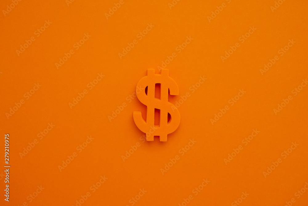 American dollar symbol on orange background macro view Stock Photo ...