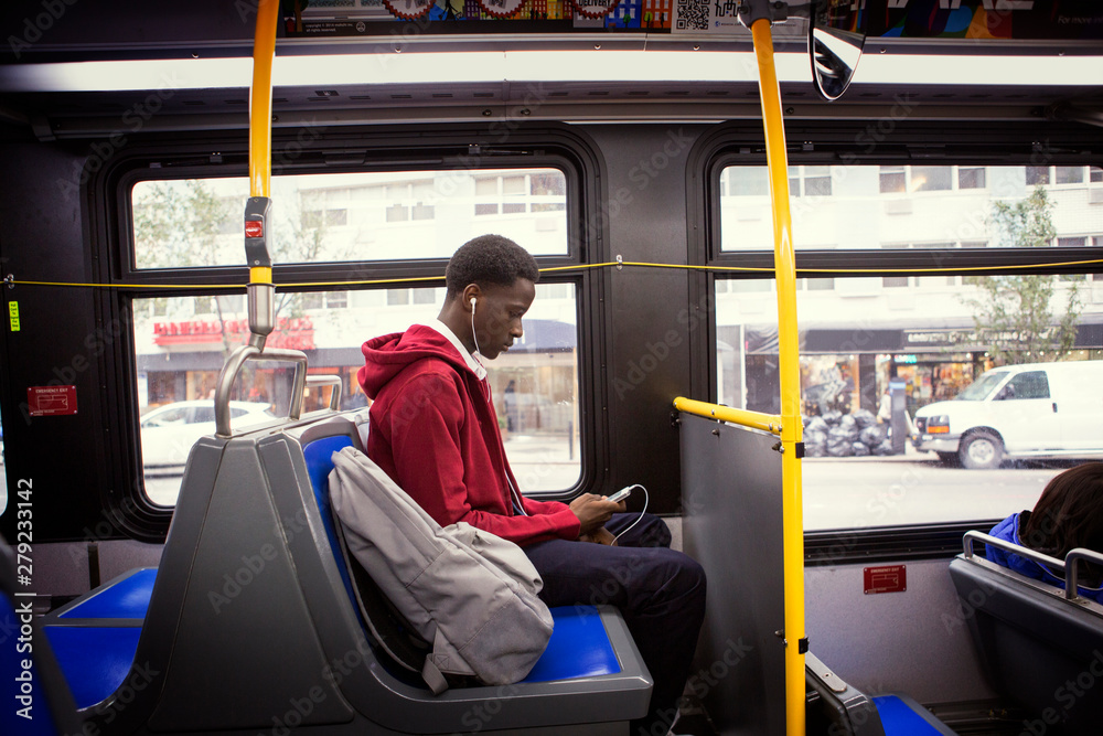 Teenage boy traveling by bus Stock Photo | Adobe Stock