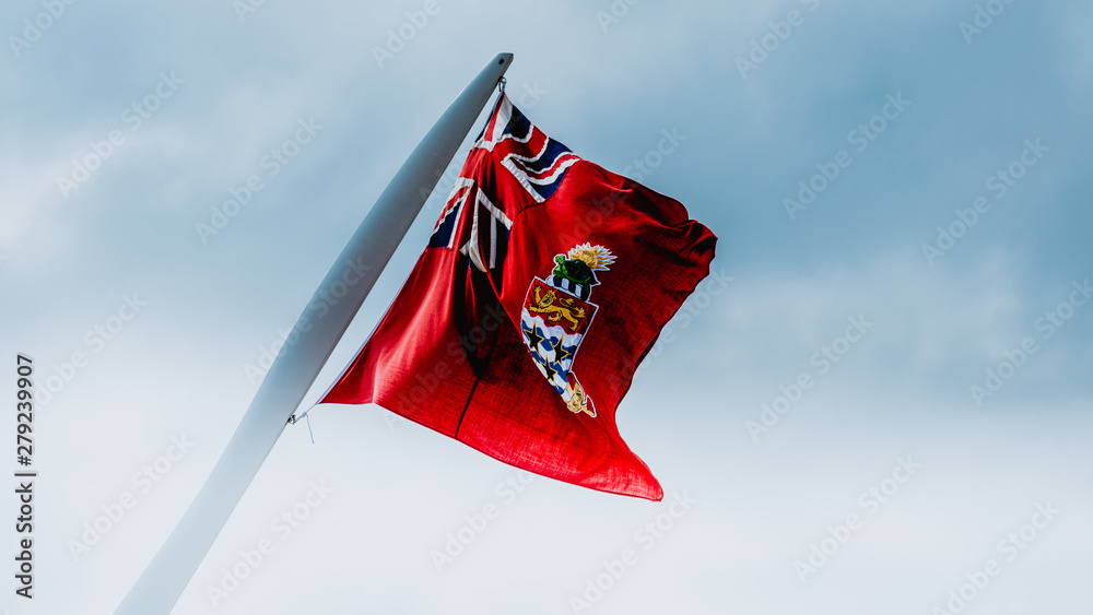 Kajmany czerwona flaga flaga Kajmanów Stock Photo | Adobe Stock