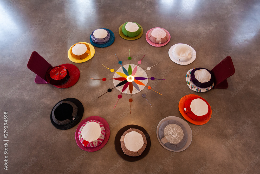 Sacred items form circle in prayer room. A high angled view on the ...