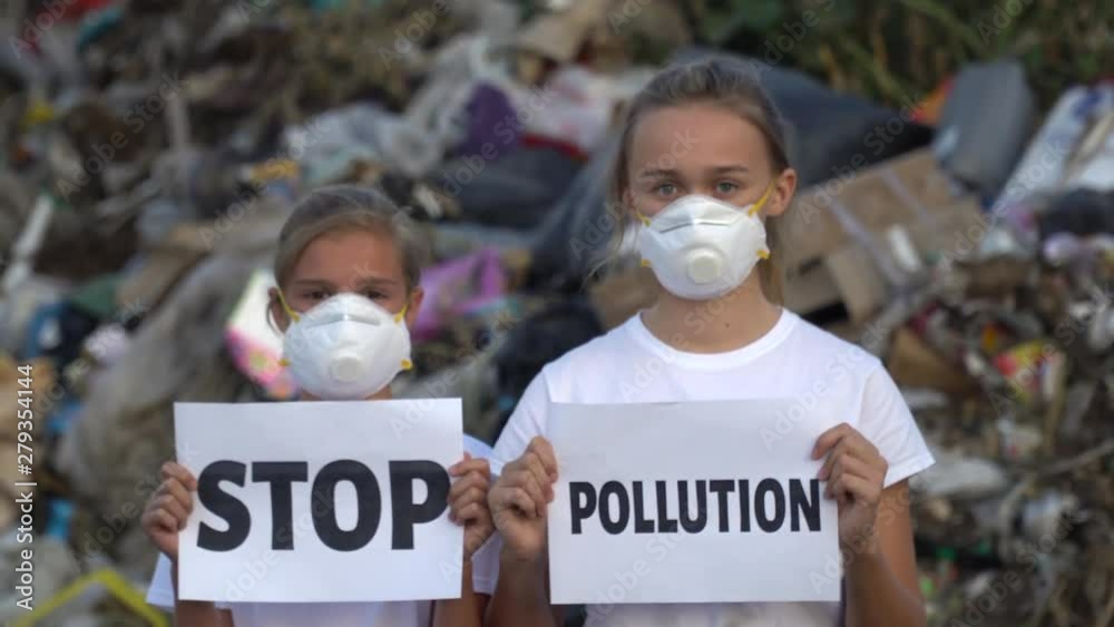 GIRL Activists With stop pollution Posters On Waste Dump. Recycle, Eco ...