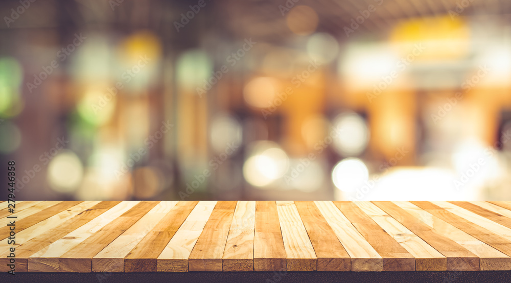 Wood texture table top (counter bar) with blur light gold bokeh in cafe ...