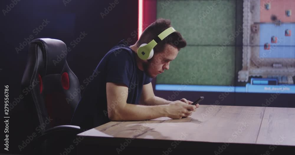 Two men playing mobile games at a tournament Stock Video | Adobe Stock