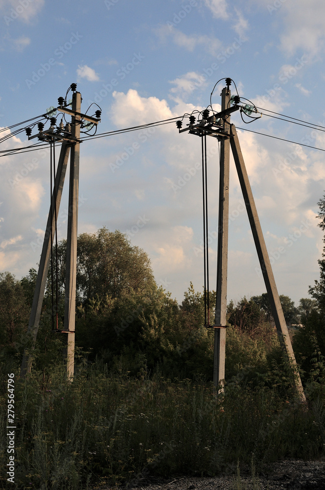 High voltage tower on a lot of down-junction power station on a ...