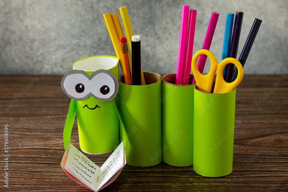 Paper Roll Pencil Holder the new school year on wooden table. Welcome ...
