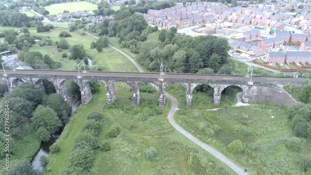Famous Sankey valley viaduct aerial pull back tilt up reveal across ...