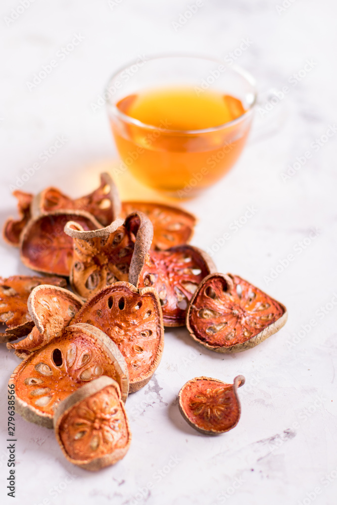 Matum thai tea. Bael fruit tea and slices of dried bael fruit Stock ...