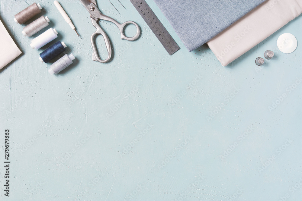 Blue textured background with sewing tools Stock Photo | Adobe Stock