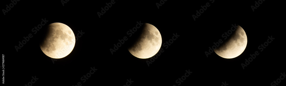 Montage of progressing partial lunar eclipse on a full moon ...