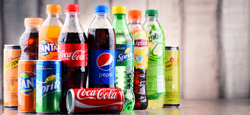 Bottles of assorted global soft drinks Stock Photo | Adobe Stock