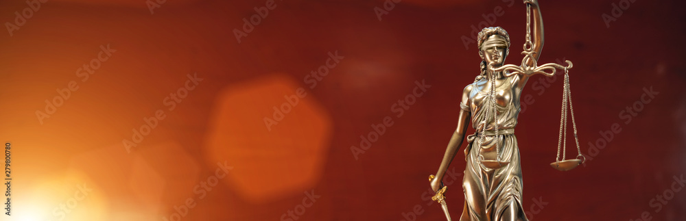 Statue of lady justice on bright background - Side view with copy space ...