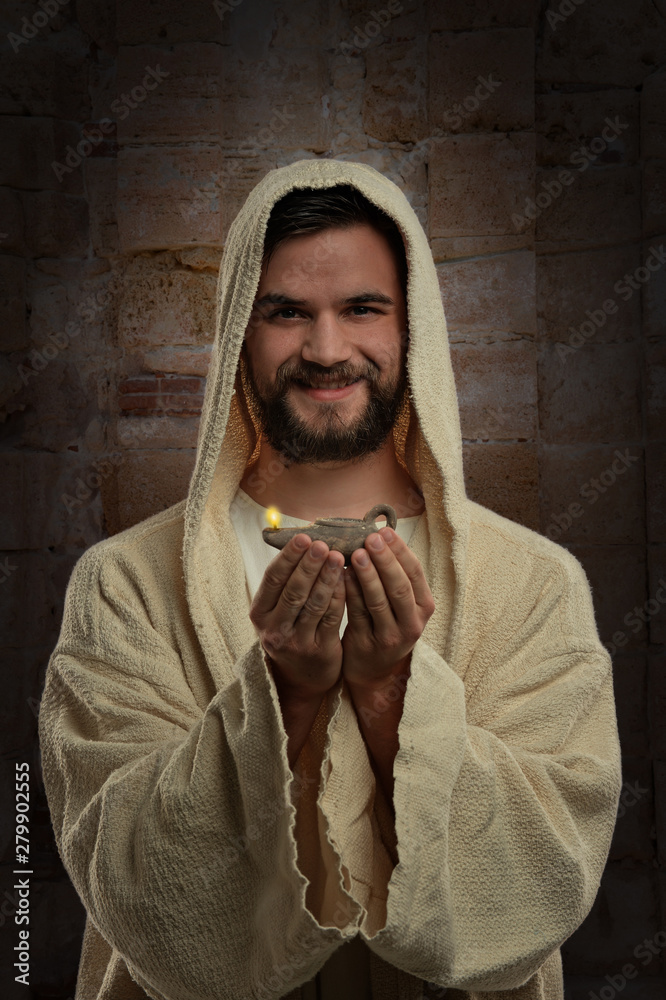 Portrait of Jesus Holding Ancient Oil Lamp Stock Photo | Adobe Stock