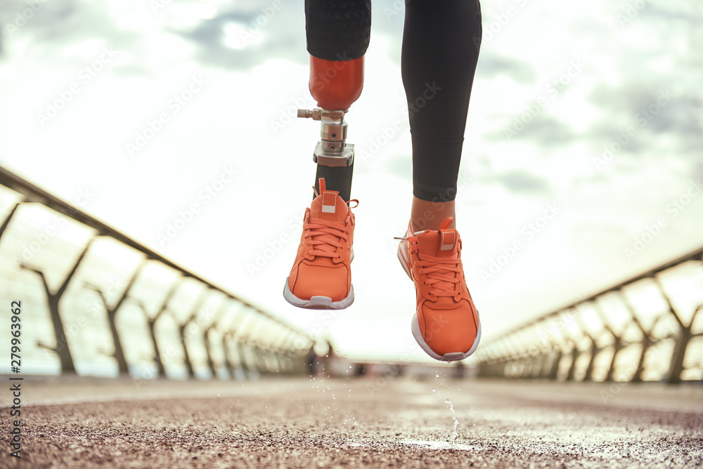 Never give up Cropped photo of disabled woman with prosthetic leg in ...