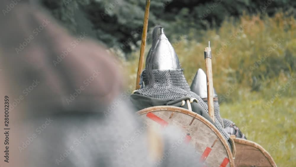 Knight warriors marching forward. Medieval soldiers in full plate armor ...