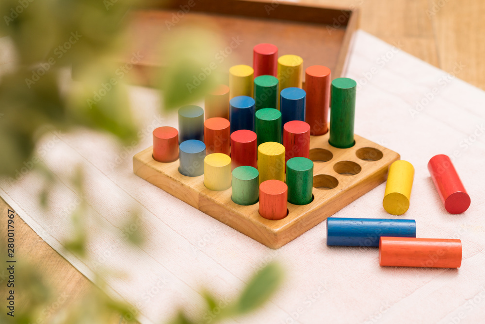 Top view closeup of colorful wooden Montessori sensorial material ...