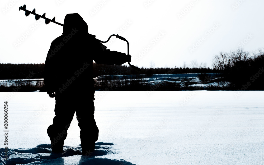 Sillouette Man Ice Fishing