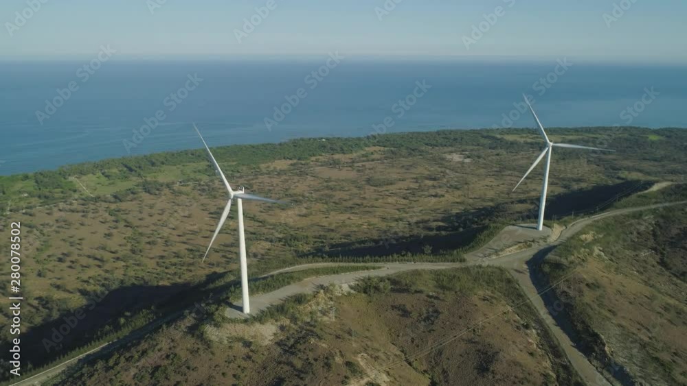 Aerial view of wind turbines for electric power production on the ...