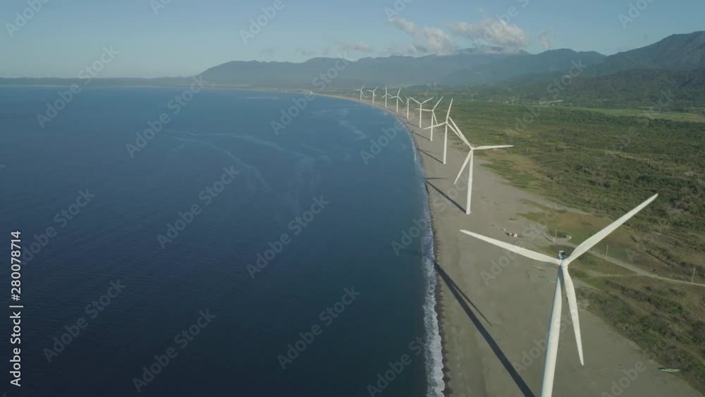 wind turbines and windmills for electric power production on the coast ...