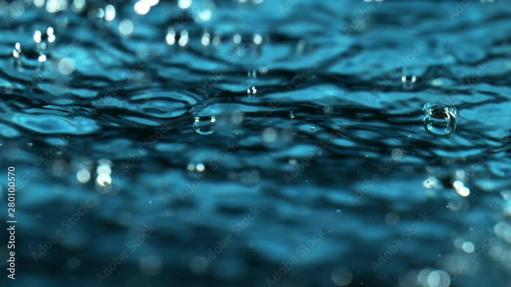 Super slow motion of bubbling water in detail. Filmed on very high ...