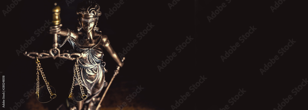 Statue of lady justice on bright background - Side view with copy space ...