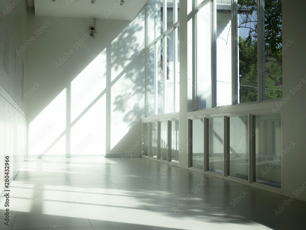 Industrial interior with bright light coming through windows. Stock ...