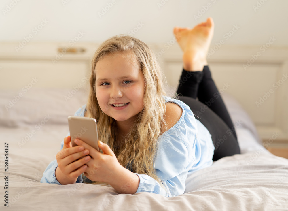 Happy Cute Kid Playing Games And Watching Videos On Social Media On