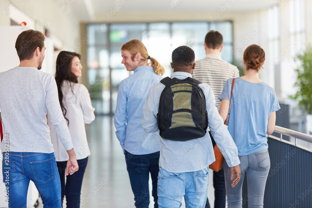 Group of students together in university Stock Photo | Adobe Stock