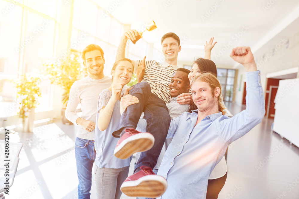 Cheering students as winners Stock Photo | Adobe Stock