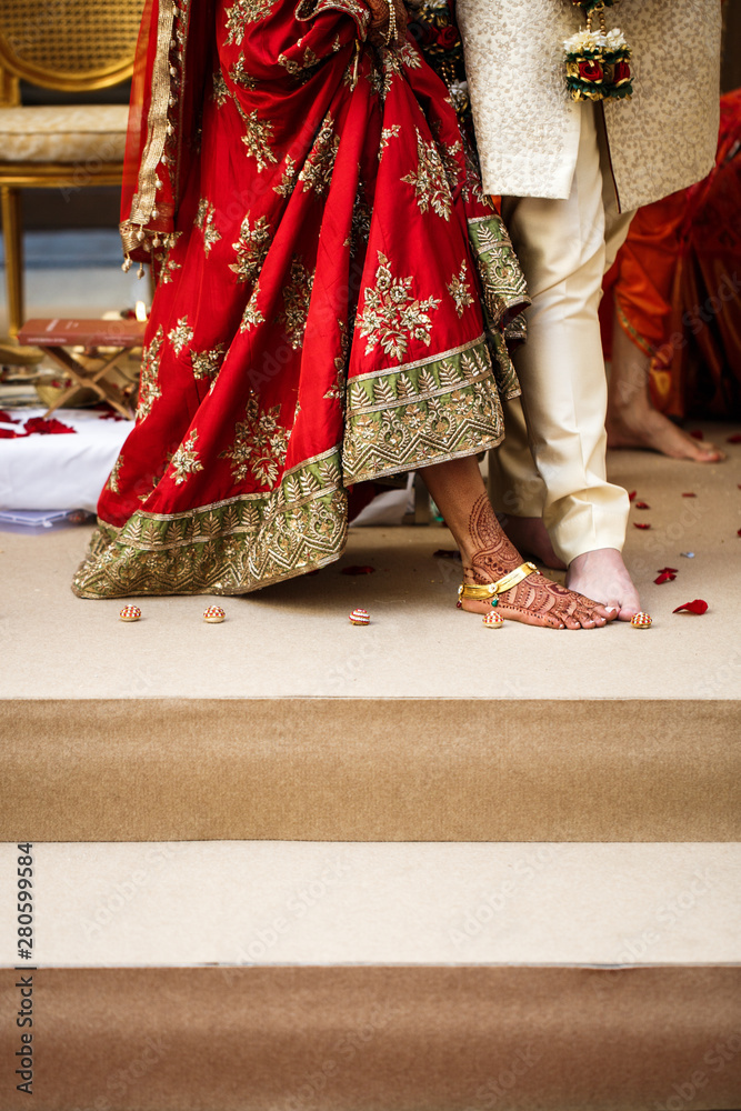 Indian wedding traditions. Bride and groom makes steps together Stock ...