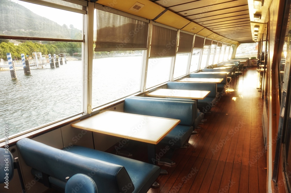 Tables for passengers on the deck of the ship. Stock Photo | Adobe Stock
