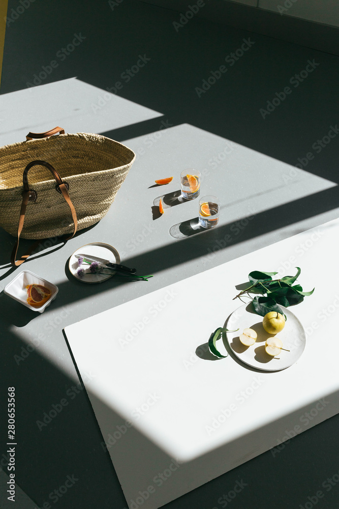 Behind the scenes of a still life photoshoot in a photographer's studio ...