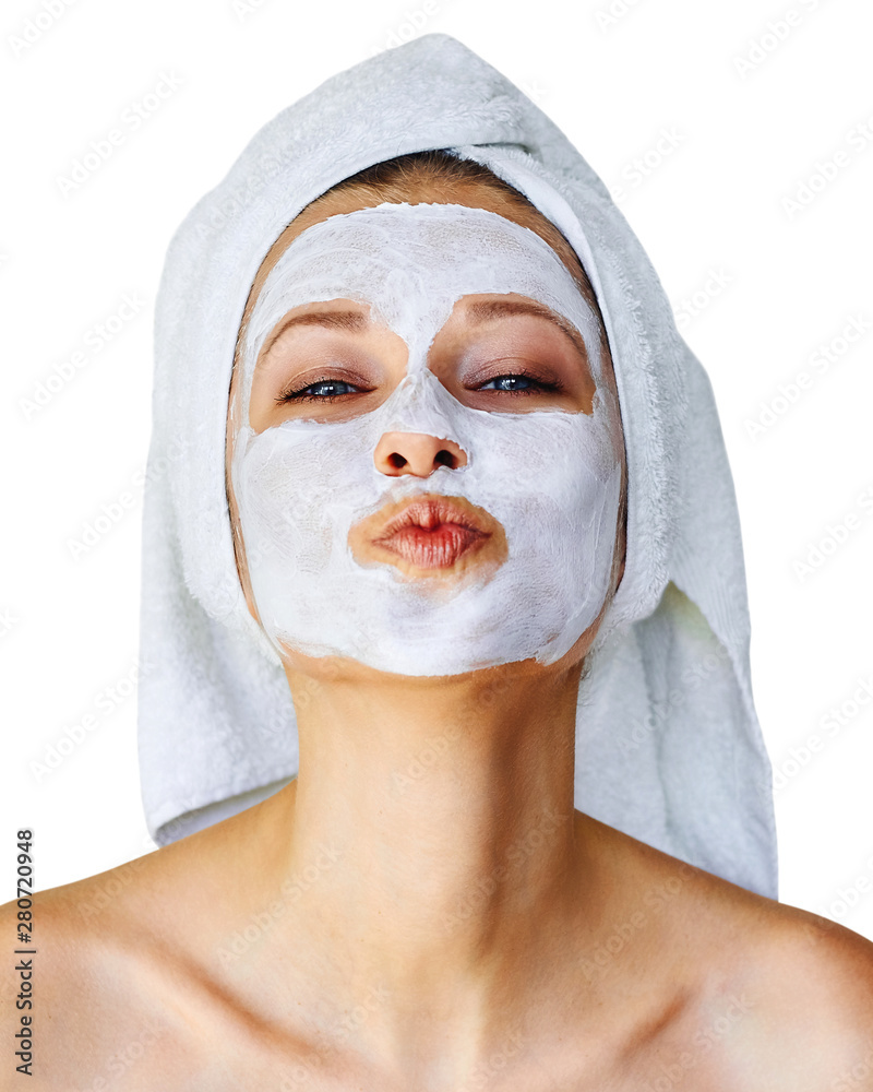 Young woman with facial mask on her face. Skin care and treatment, spa ...
