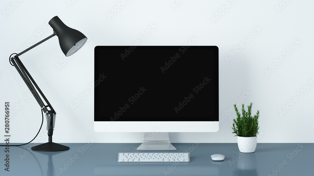 mouckup the computer on the table in front of the white wall 3d ...