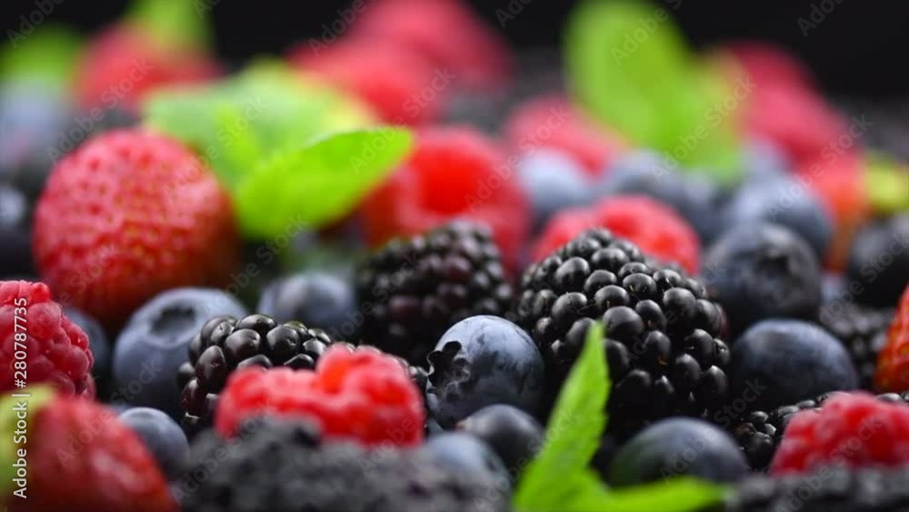 Berries. Various colorful berries background. Strawberry, raspberry ...