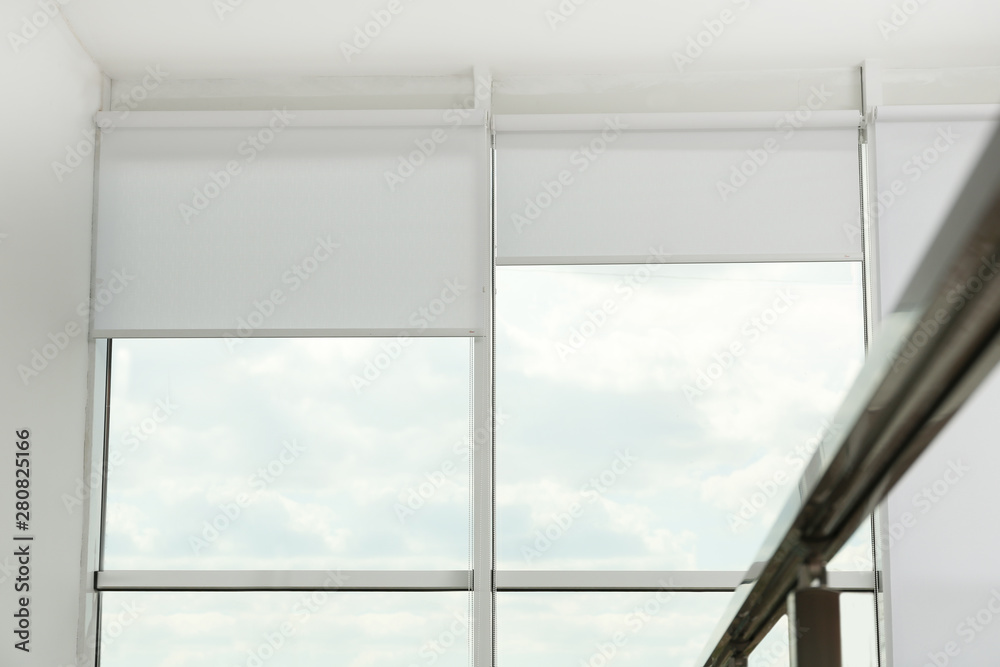 Large window with open roller blinds indoors Stock Photo | Adobe Stock