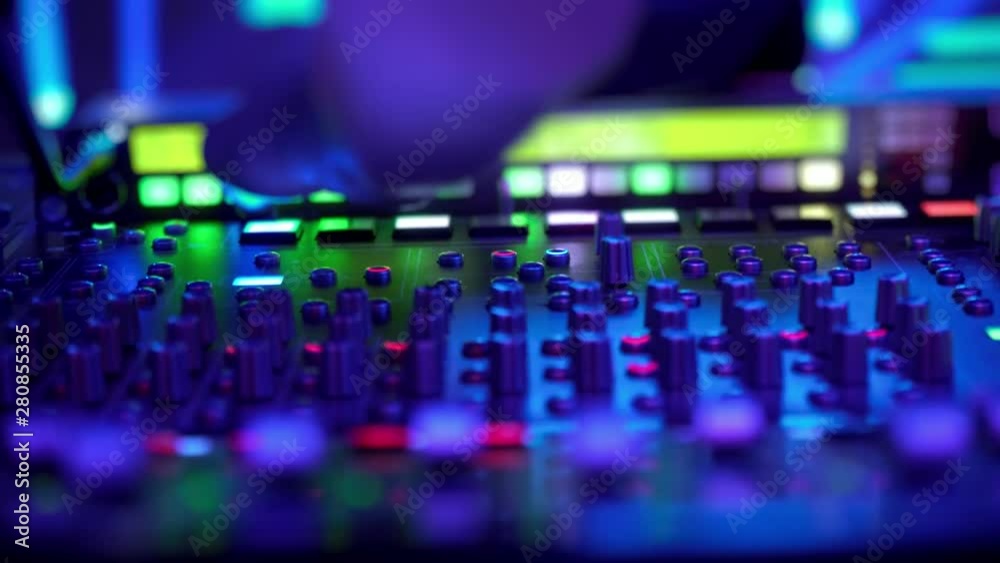 Remote control for adjusting the sound. Audio mixer. Sound engineer ...