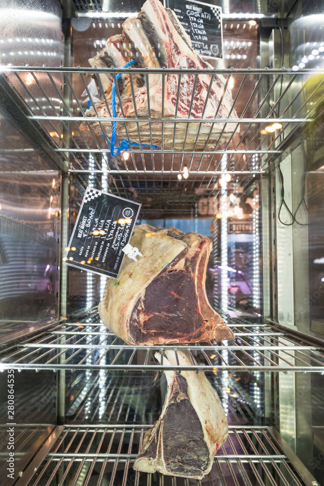 Display of Dry Aged Meat Steaks in butchers shop or restaurant in an ...