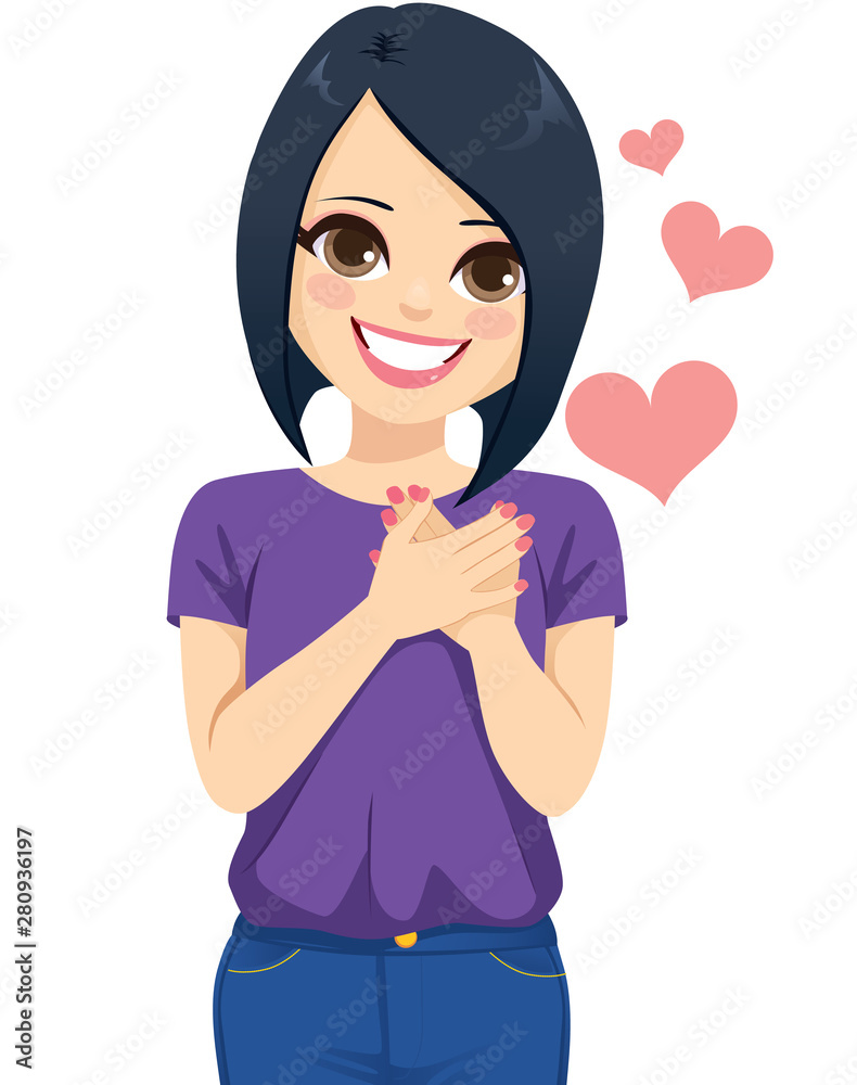 Young woman with hands on heart making lovely grateful face expression ...