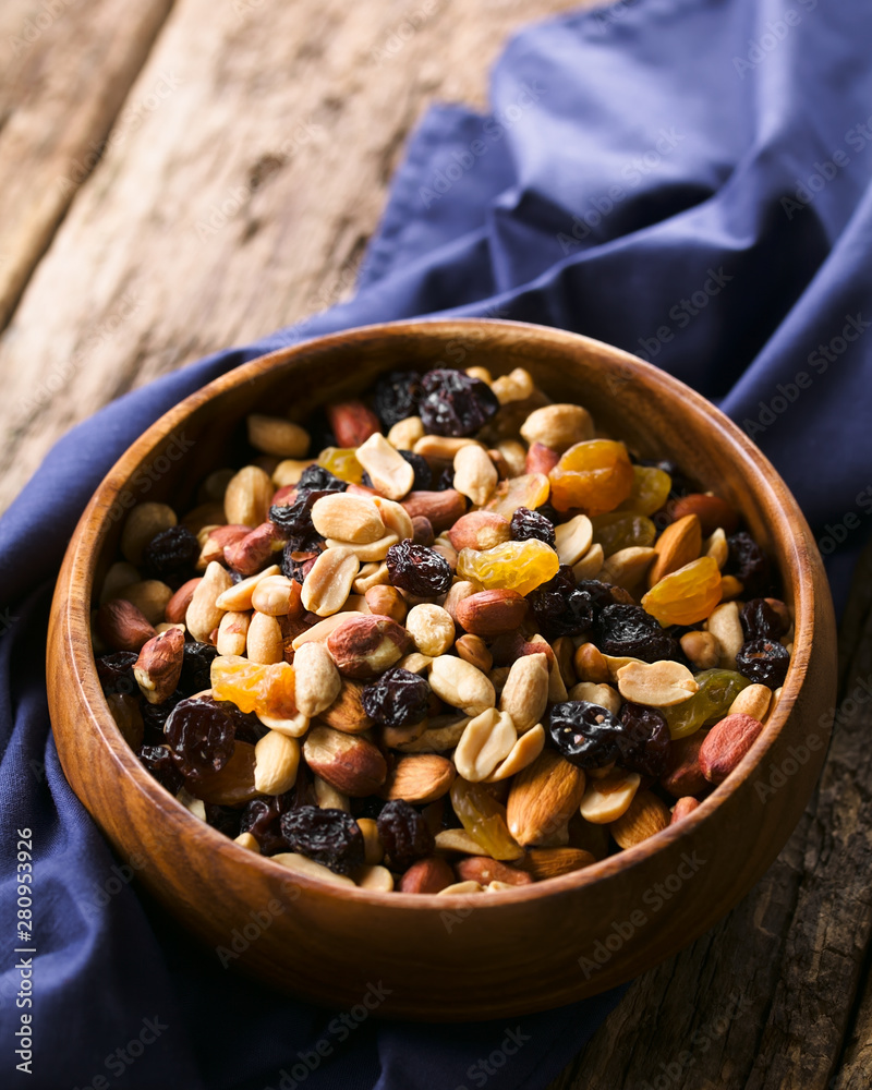 Healthy trail mix snack made of nuts (walnut, almond, peanut) and dried ...